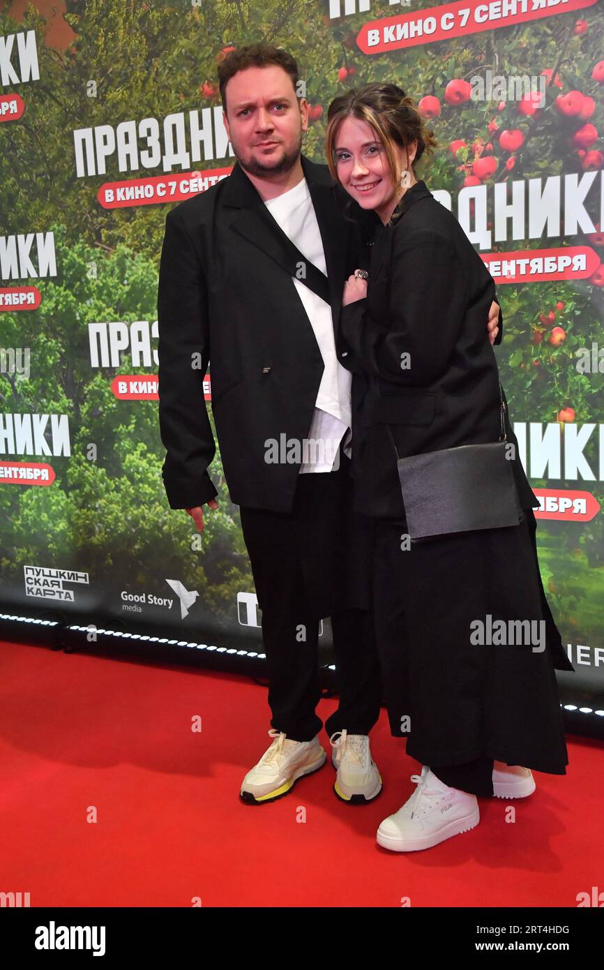 Moscow. Director Boris Dergachev (left) with his wife at the premiere of the comedy `Holidays ...